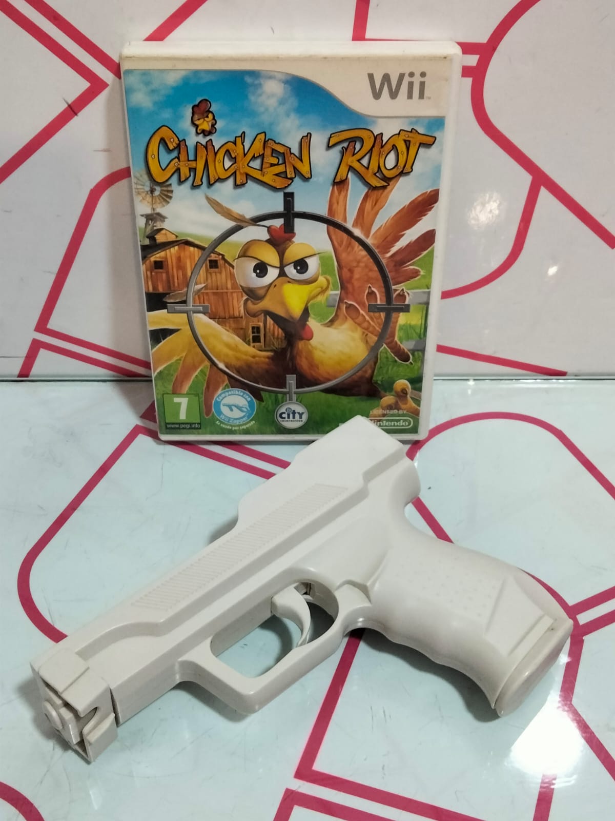 VIDEOJUEGO WII CHICKEN RIOT CON CAJA Y PISTOLA **CAJA EN MAL ESTADO ...